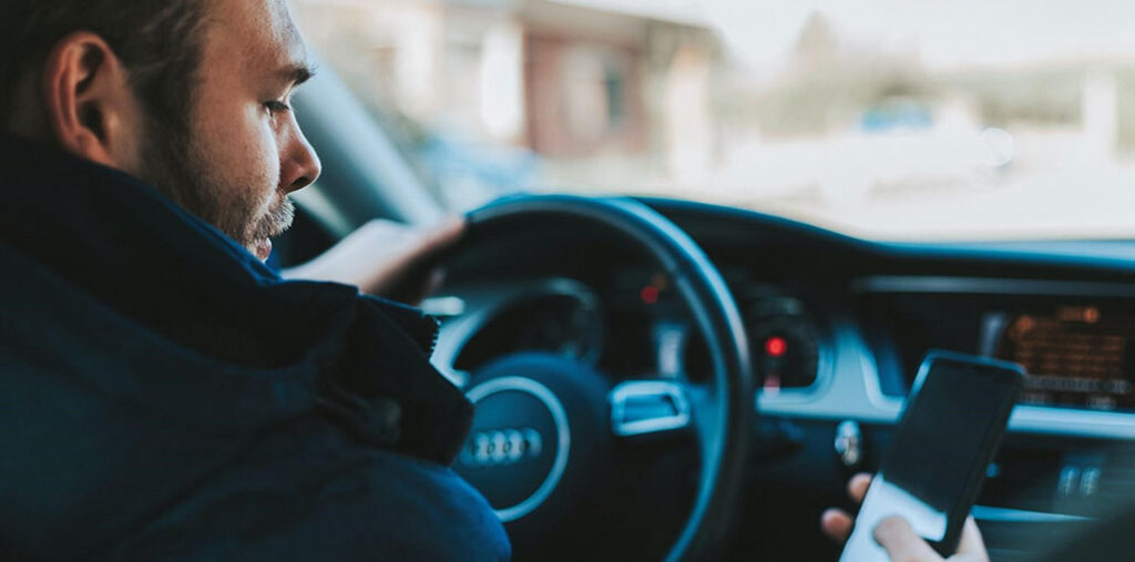 The Warning Signs of Distracted Driving